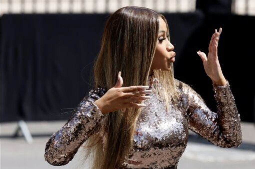 Cardi B off the hook for tossed microphone that hit a fan in the crowd ...